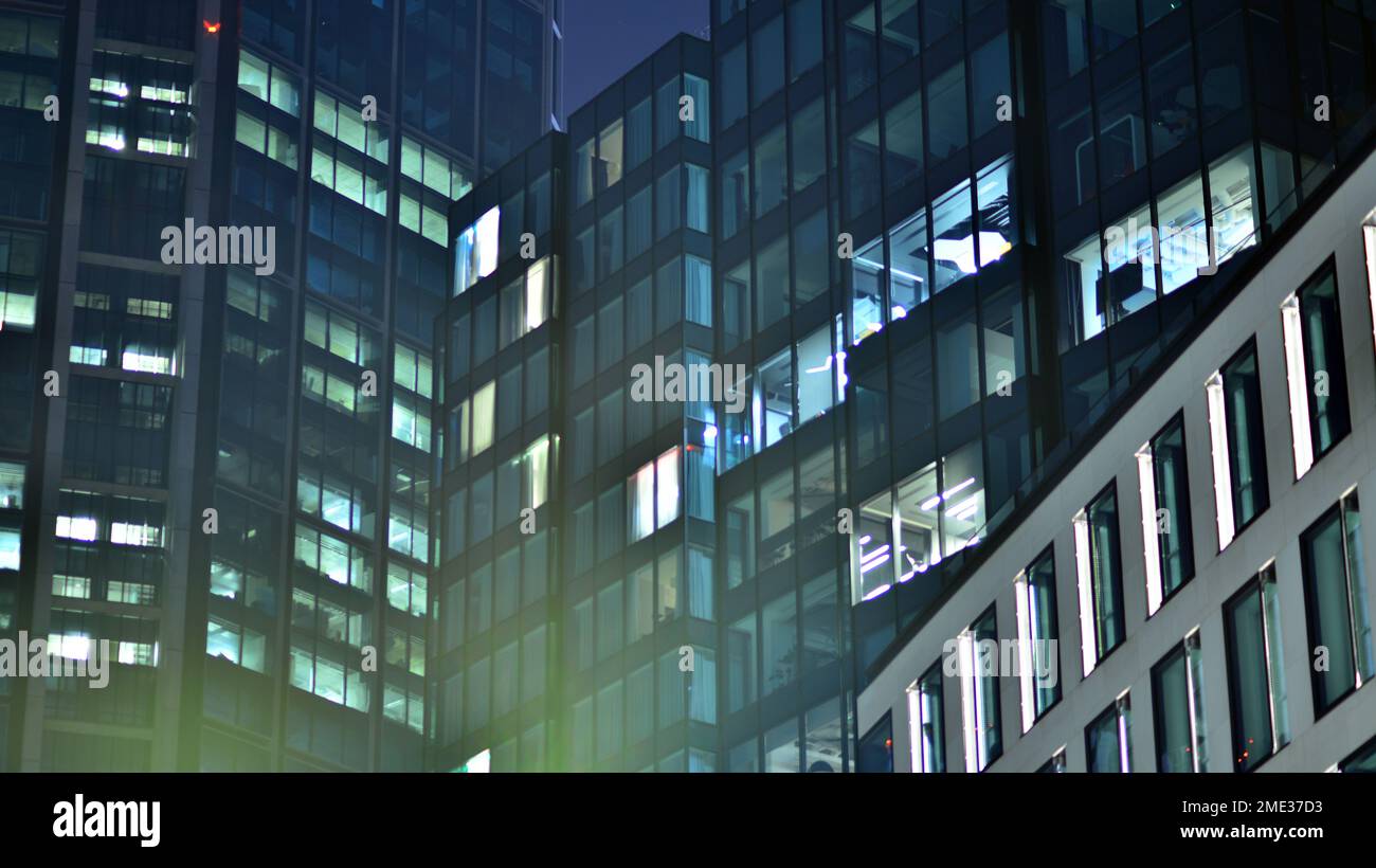 Modern office building in city at the night. View on illuminated ...