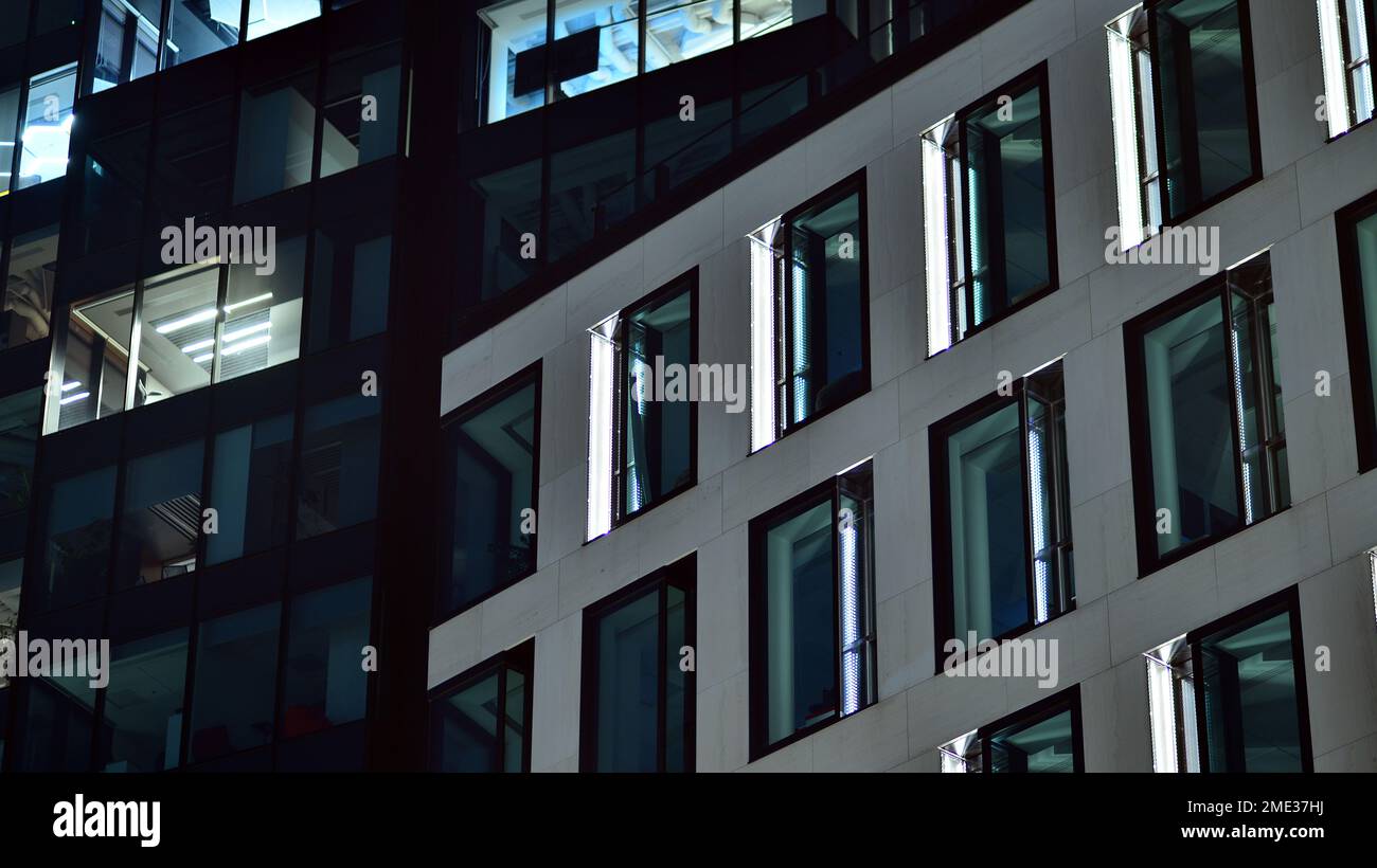 Modern office building in city at the night. View on illuminated ...