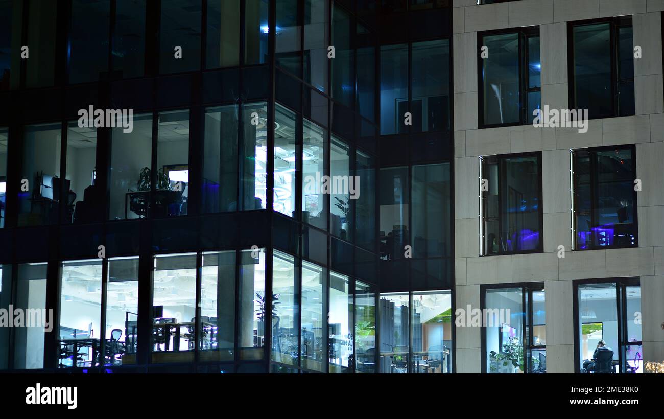 Modern office building in city at the night. View on illuminated ...