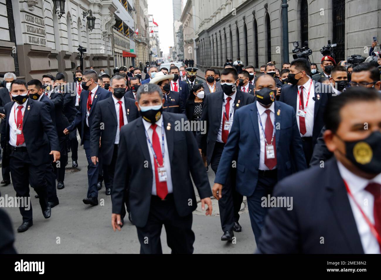 Surrounded by security, Peru's President-elect Pedro Castillo, wearing ...