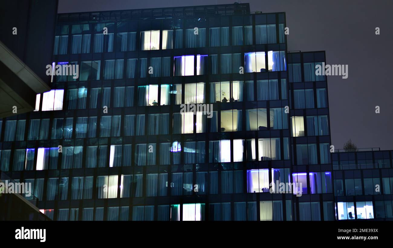Modern office building in city at the night. View on illuminated ...