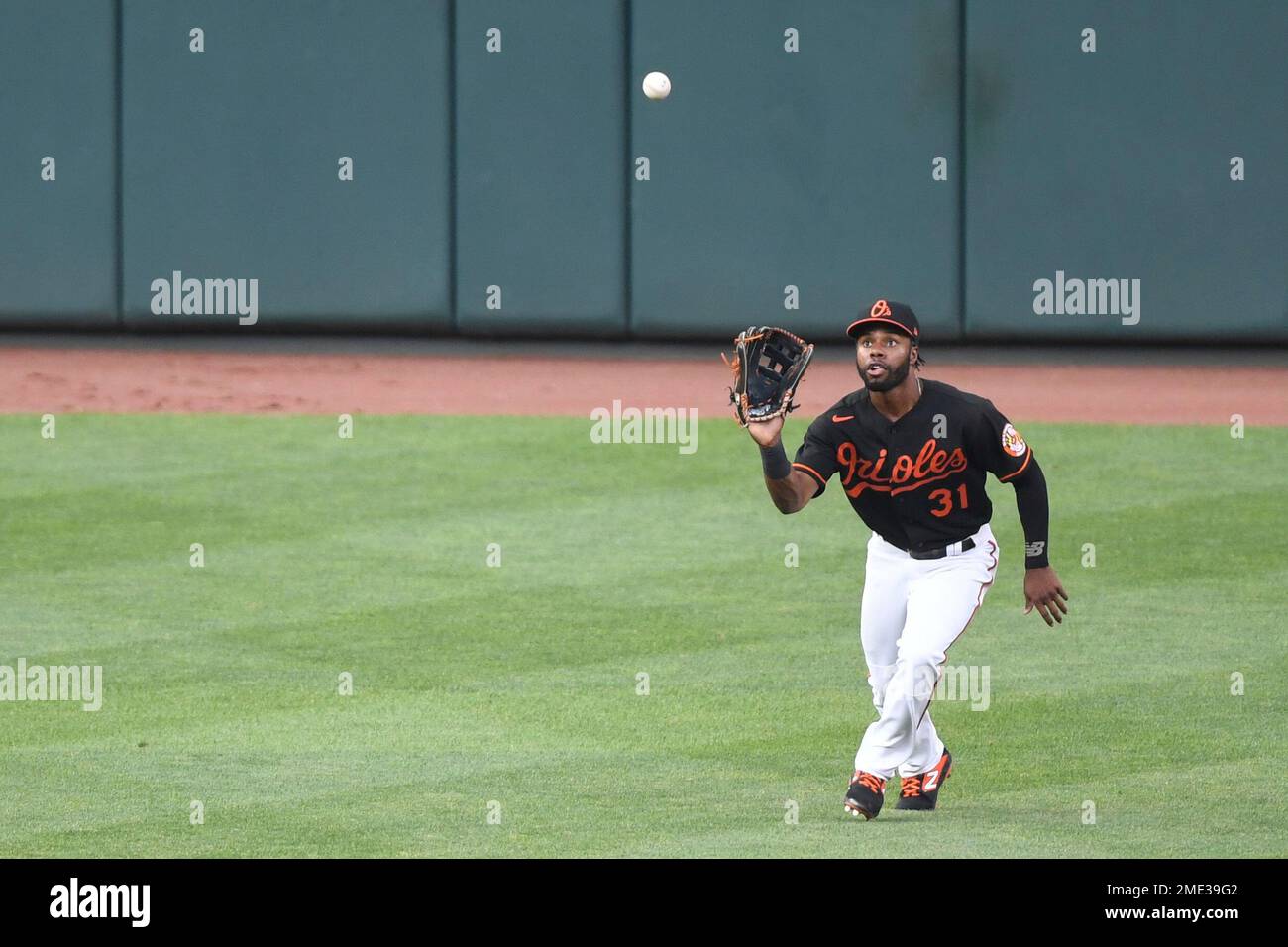 Baltimore Orioles center fielder Cedric Mullins (31) catches a fly ball ...