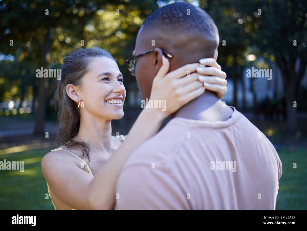Love Park And Smile With An Interracial Couple Bonding Outdoor