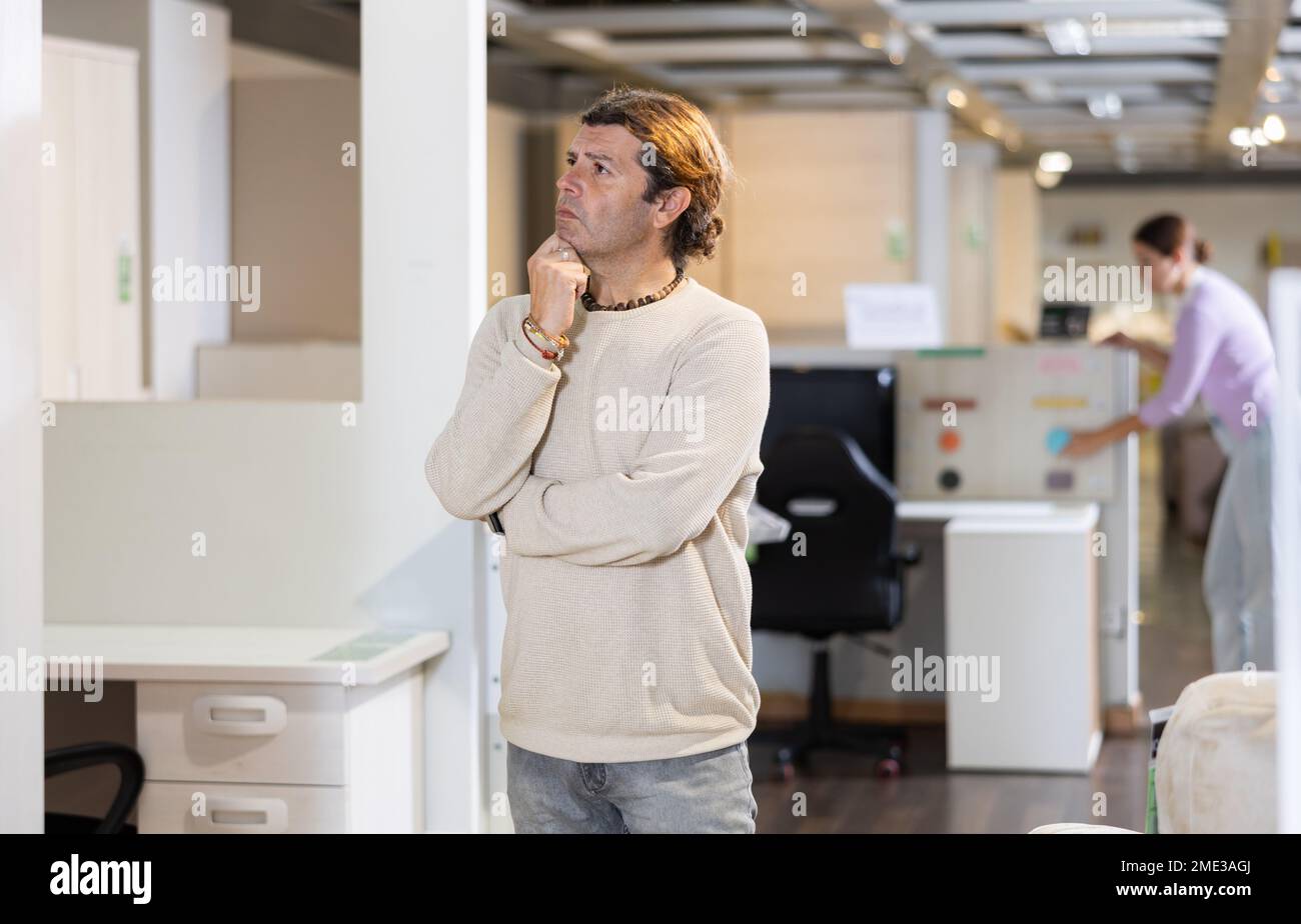 Middle aged man thinking new hi-res stock photography and images - Alamy