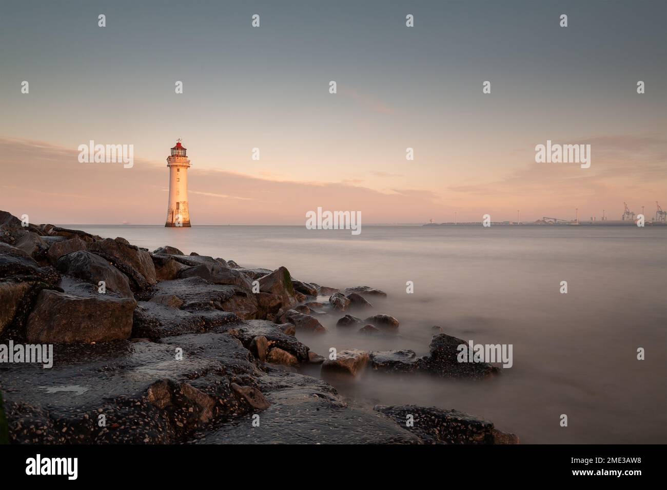 New Brighton, UK: Perch Rock Lighthouse at sunrise, long exposure as ...
