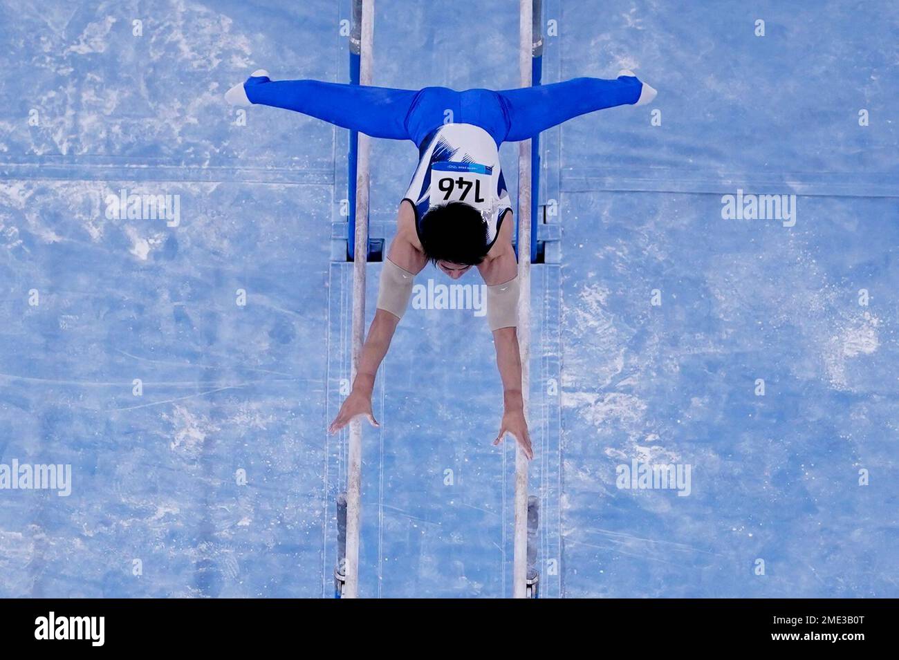 Daiki Hashimoto, of Japan, performs on the parallel bars during the ...