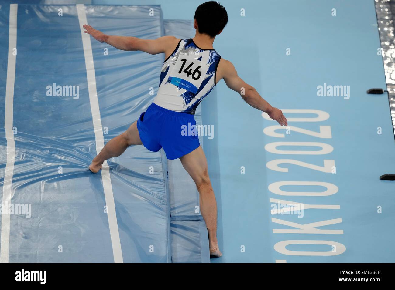 Daiki Hashimoto, of Japan, goes off the mat while performing on the ...