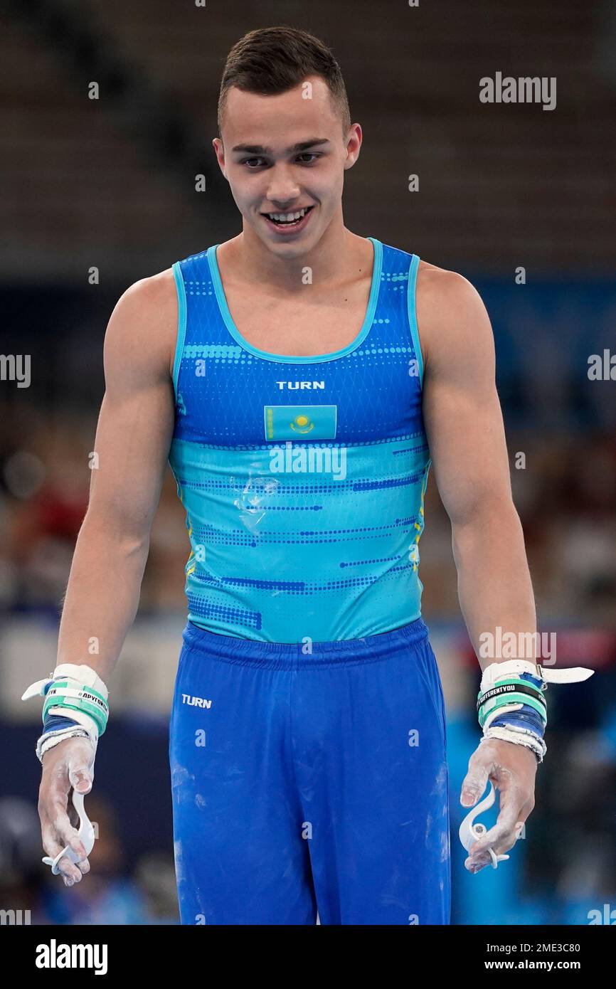 Milad Karimi, of Kazakhstan, smiles during the artistic gymnastic men's ...