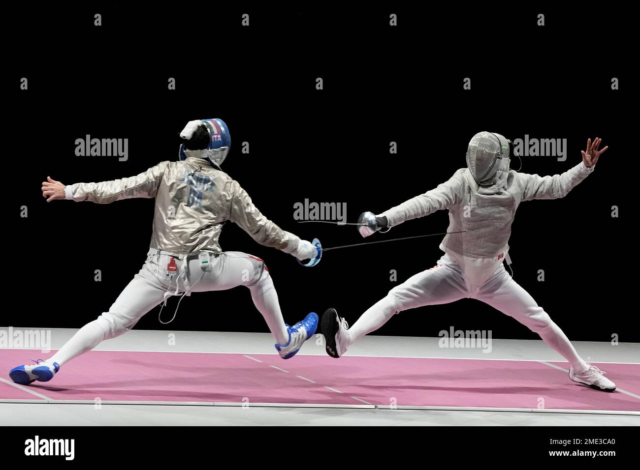 Enrico Berre of Italy, left, and Gu Bongil of South Korea compete in ...