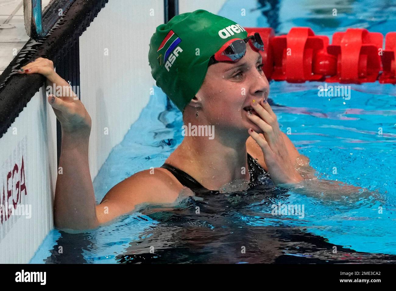 Kaylene Corbett, of South Africa, reacts after a heat in the women's ...