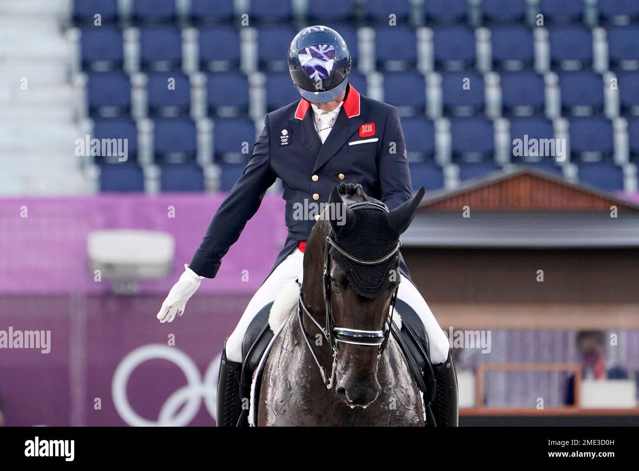 Britain's Carl Hester, riding En Vogue, bows upon after competing in ...