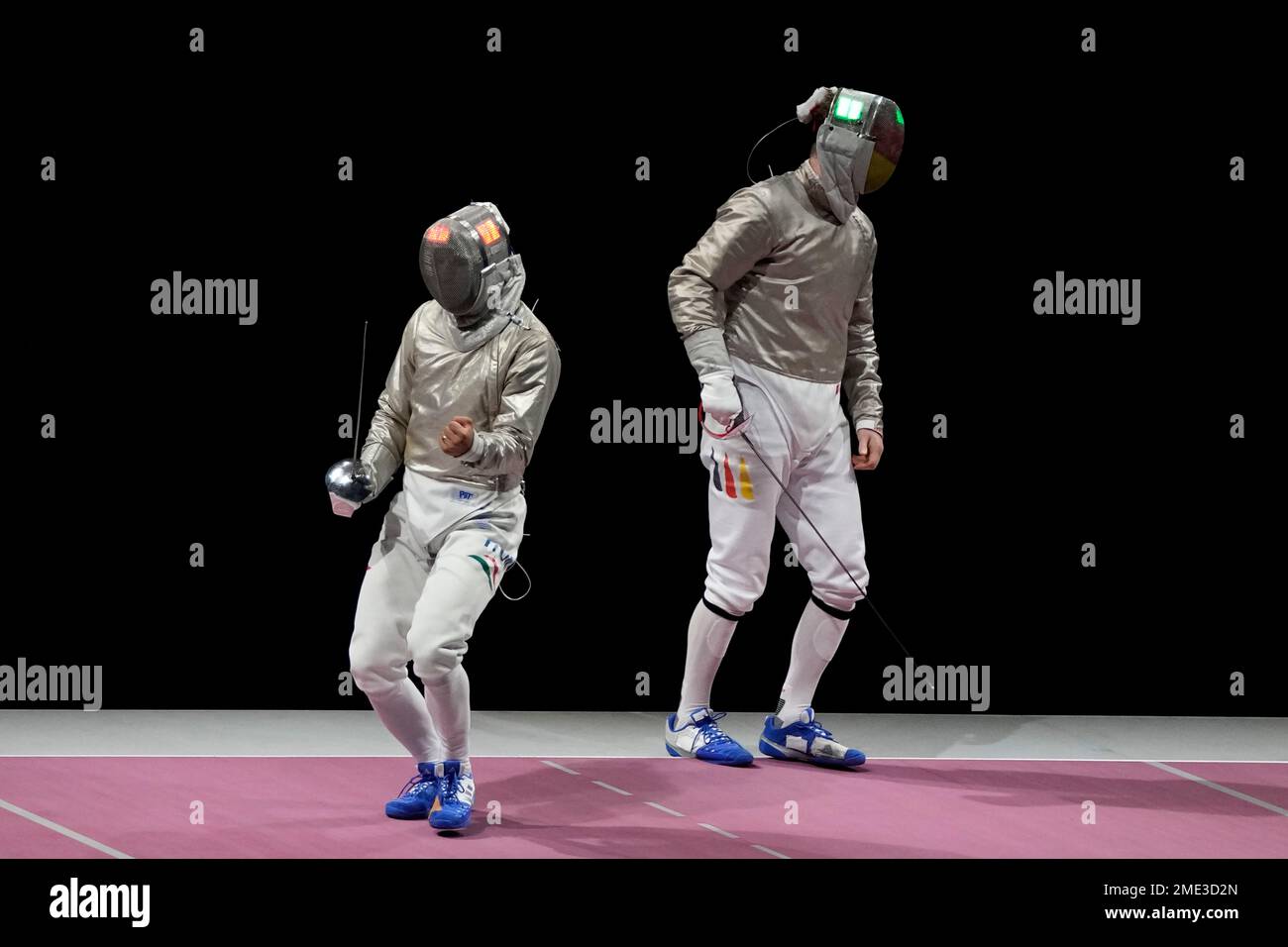 Aron Szliagyi of Hungary, left, and Richard Huebers of Germany react as ...