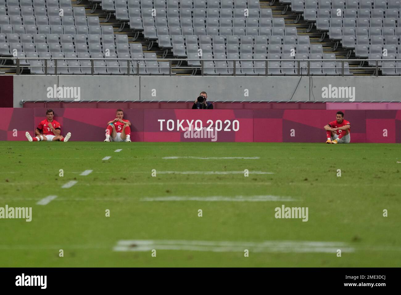 Britain's Ethan Waddleton, left, Ross McCann, center, and Ollie Lindsay ...