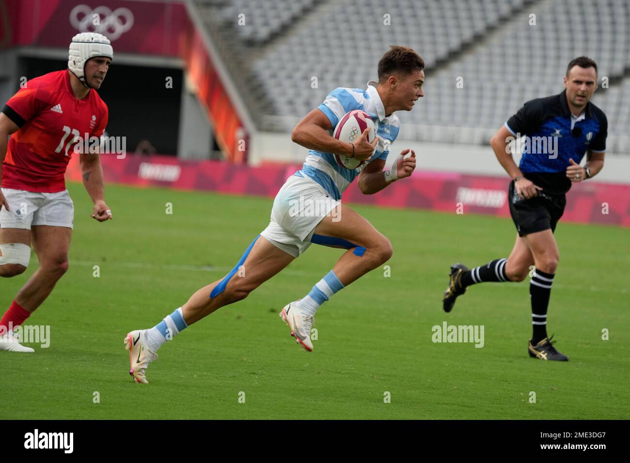 Argentina's Marcos Moneta is pursued by Britain's Ethan Waddleton, in ...