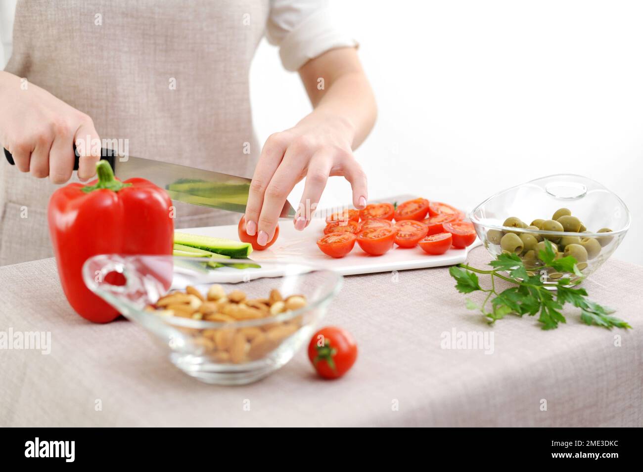Healthy eating dieting concept. High angle view of female hands cutting ...