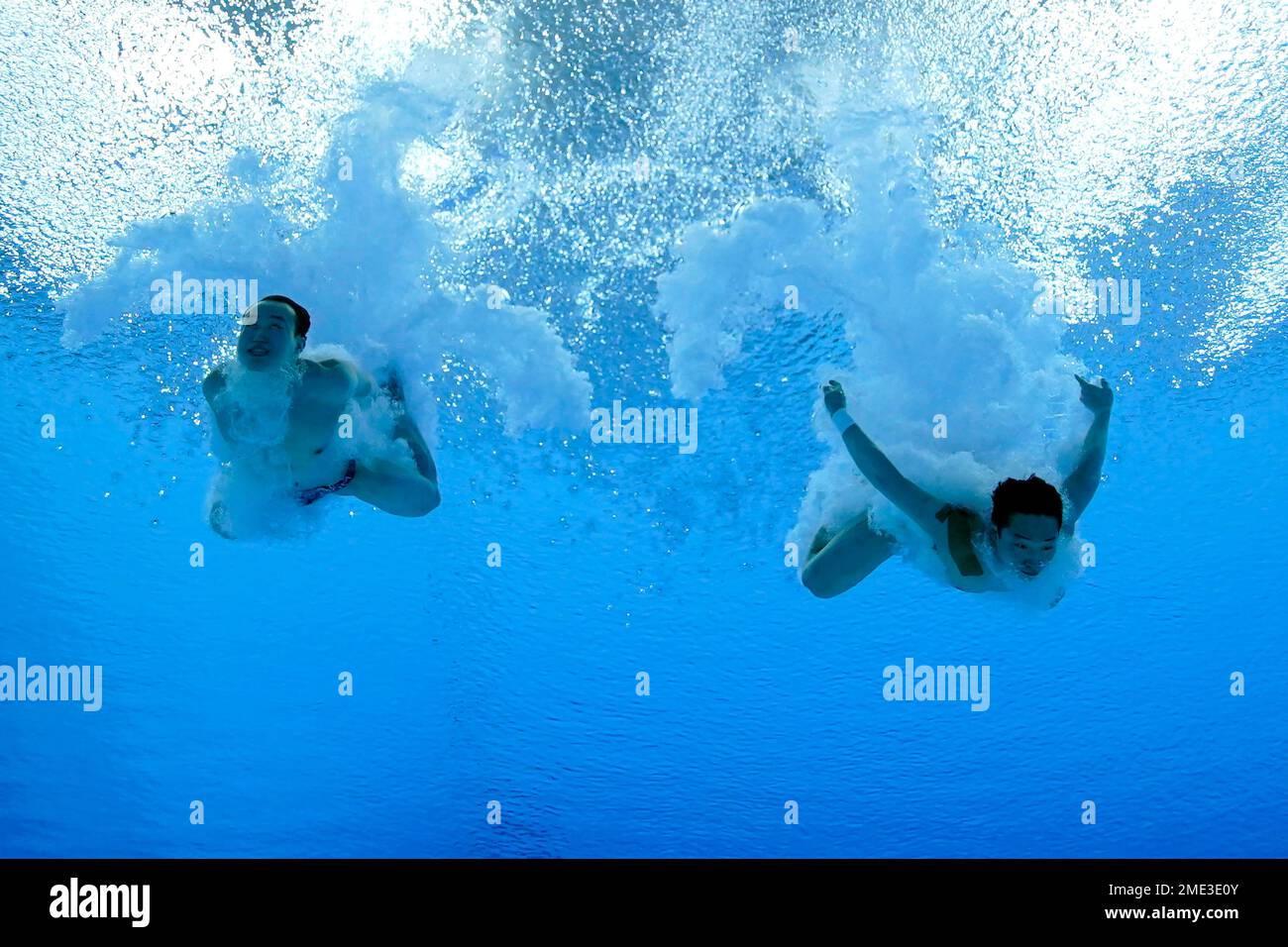 Gold medal winners China's Wang Zongyuan and Xie Siyi compete in the ...