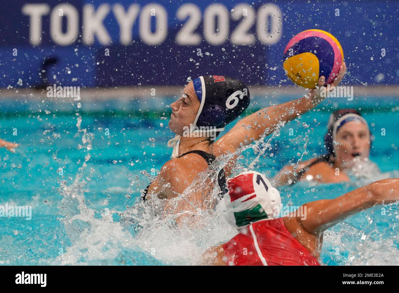 United States' Margaret Steffens (6) shots as Hungary's Anna Illes (7 ...