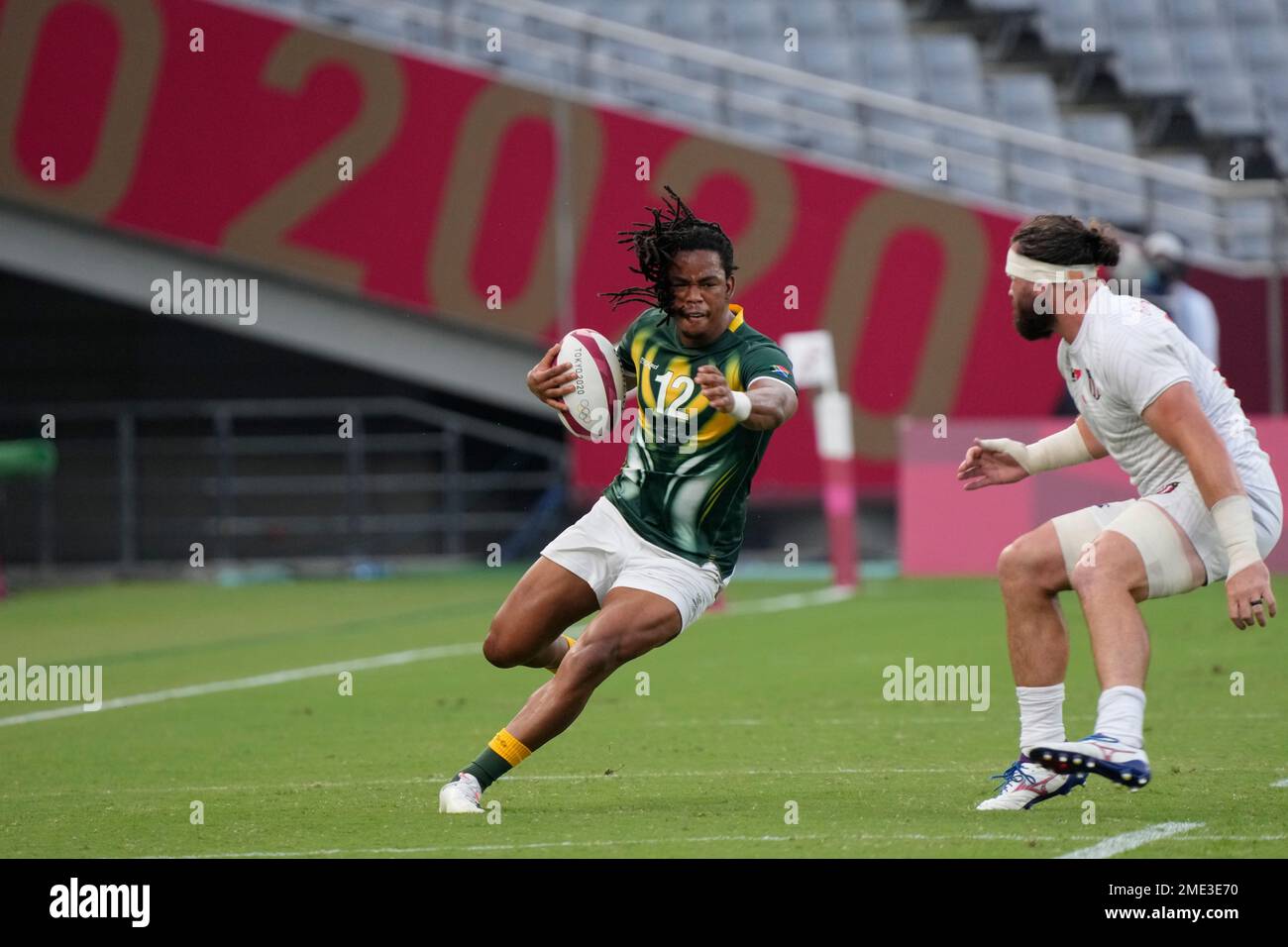 South Africa's Stedman Gans, center, tries to evade Danny Barrett of ...