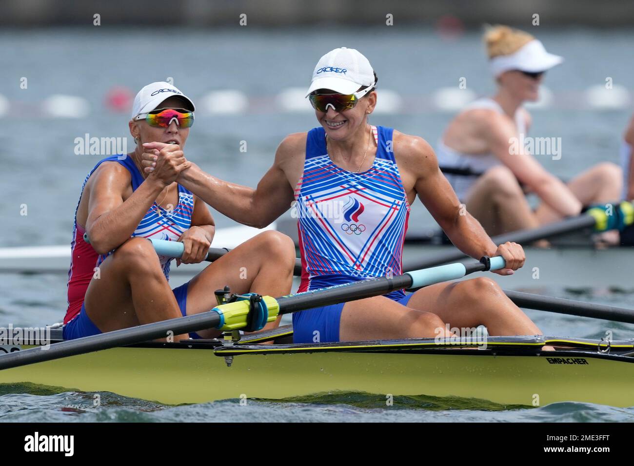 Vasilisa Stepanova and Elena Oriabinskaia of the Russian Olympic Committee react after competing ...