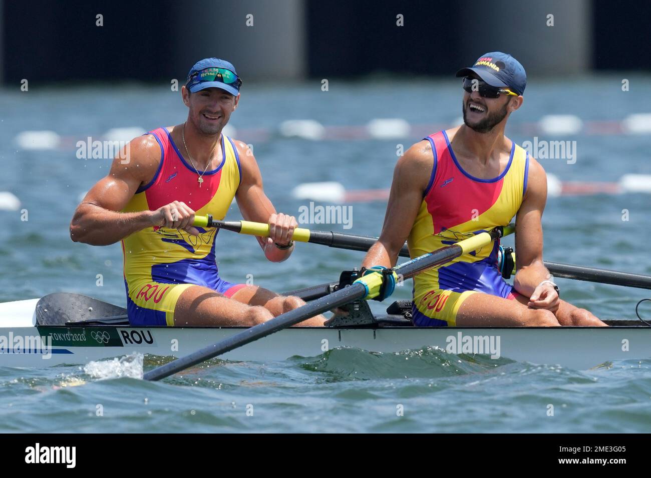 Marius Cozmiuc and Ciprian Tudosa of Romania react after competing in ...