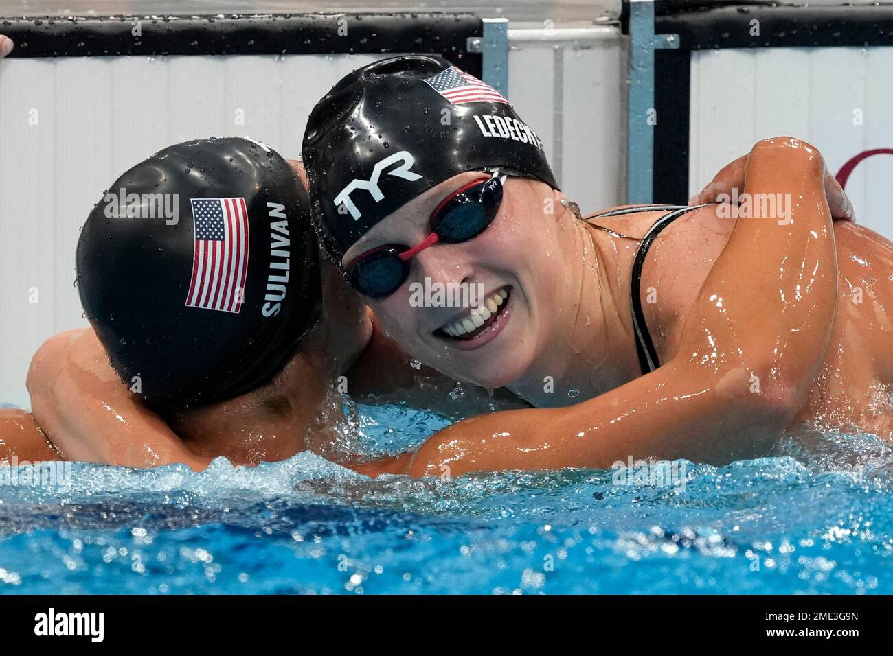 Katie Ledecky, right, of the United States, embraces compatriot Erica ...