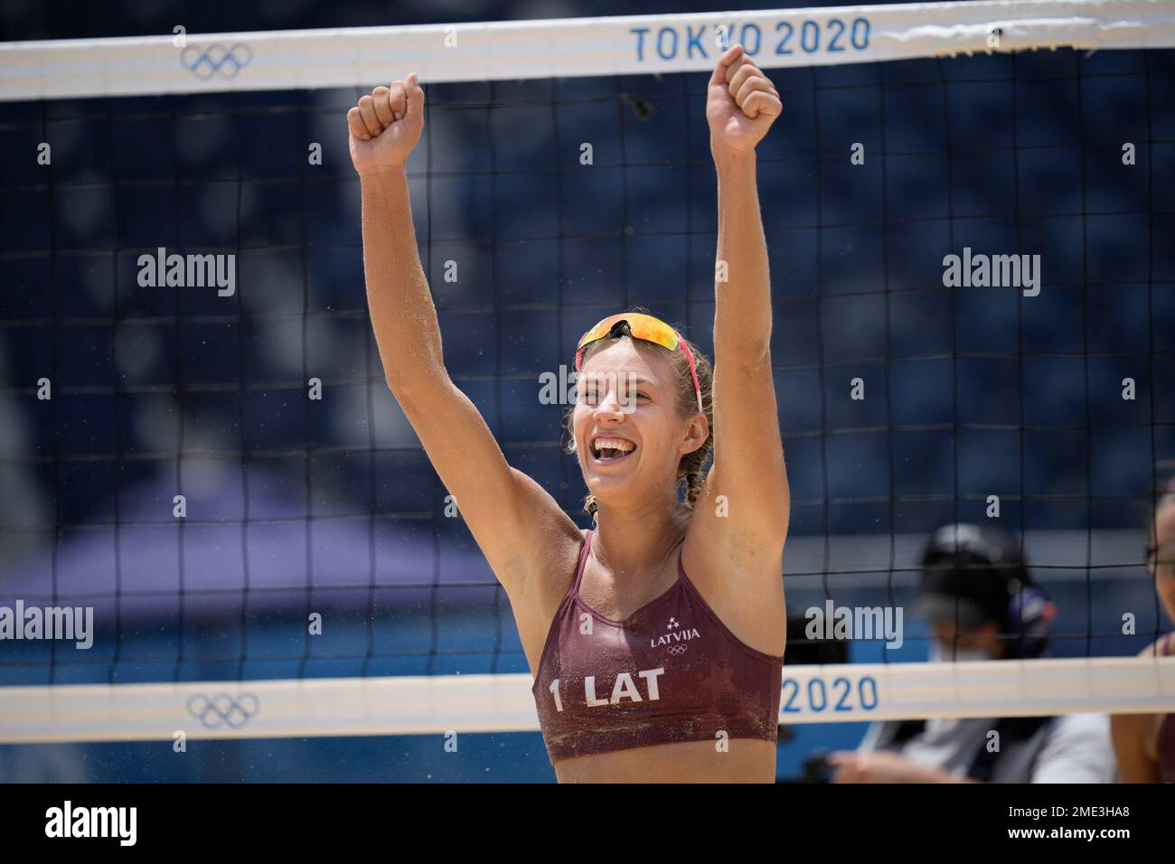 Tina Graudina, of Latvia, celebrates winning a women's beach volleyball ...