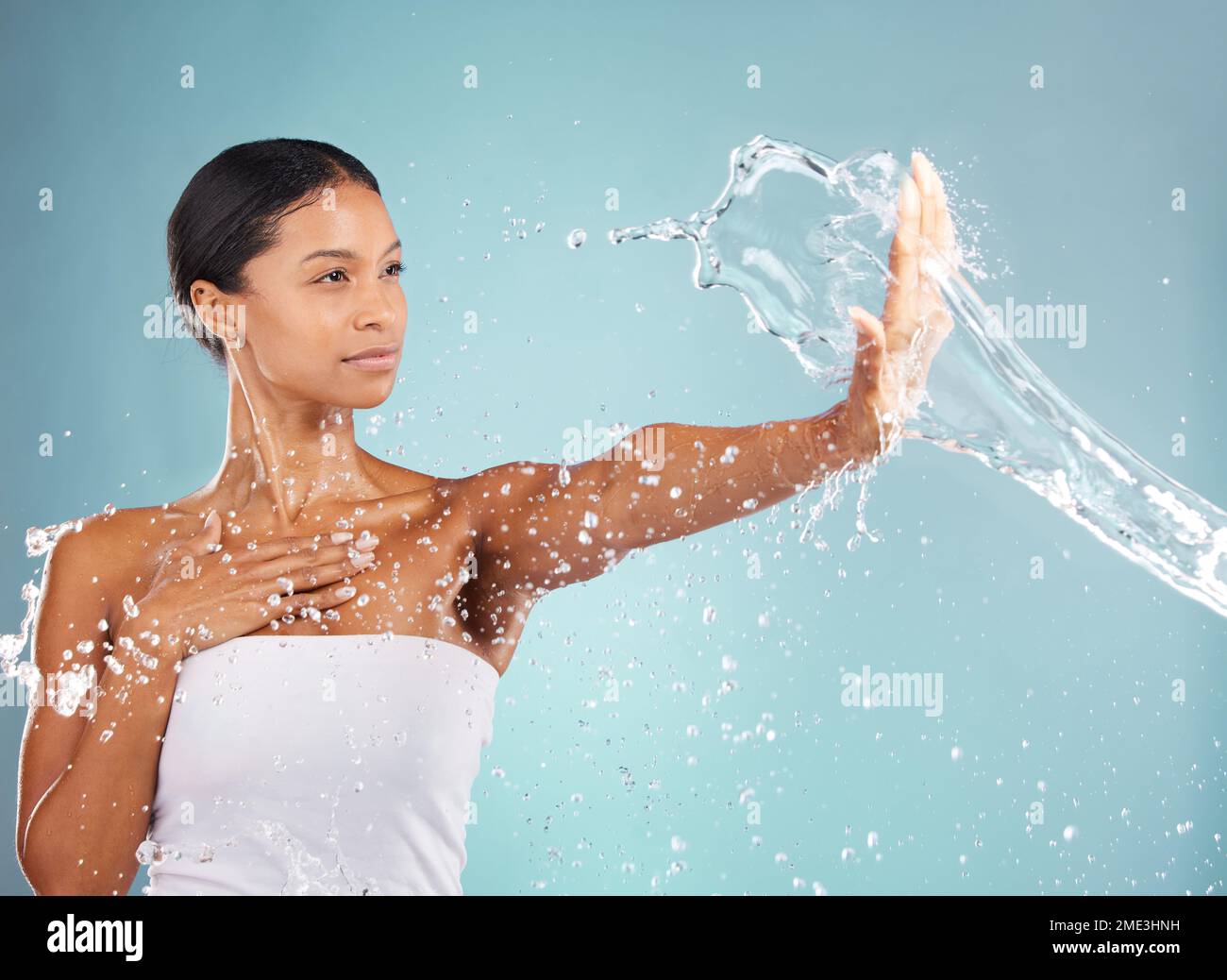 Water splash, hand and woman with skincare, beauty and wellness ready ...