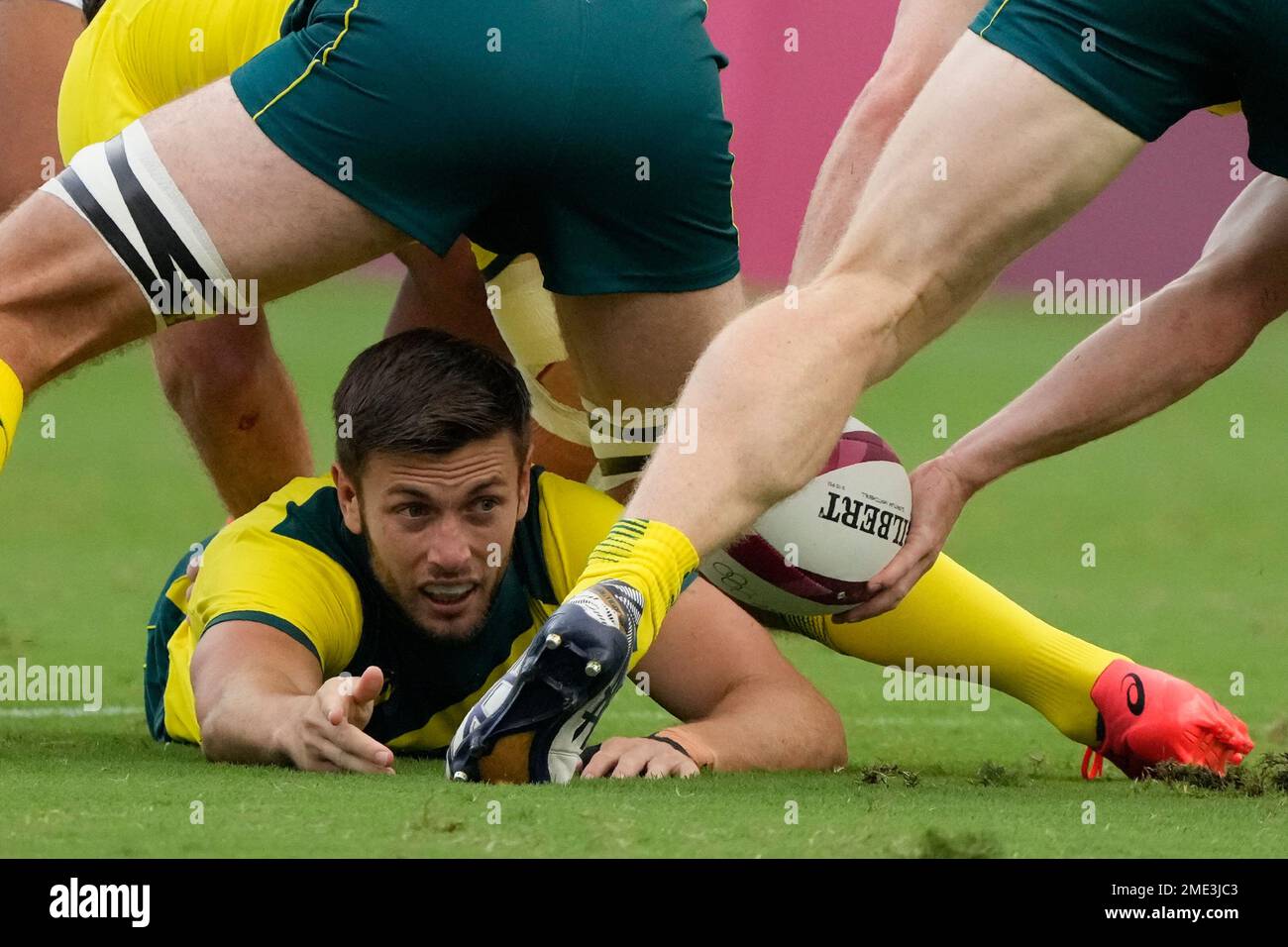 Australia's Josh Turner feeds the ball out, in Australia's men's rugby ...