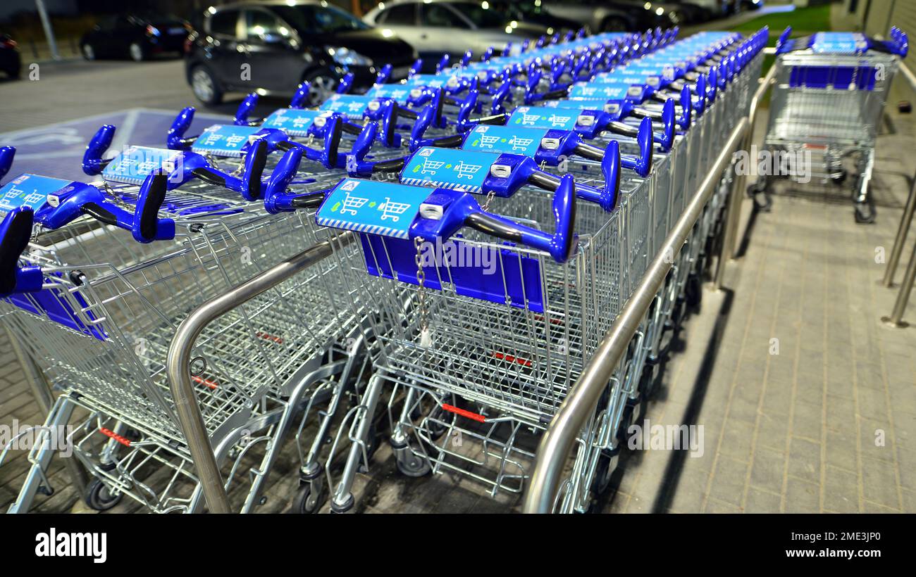 Warsaw, Poland. 29 November 2022. Row of shopping carts outside Aldi ...