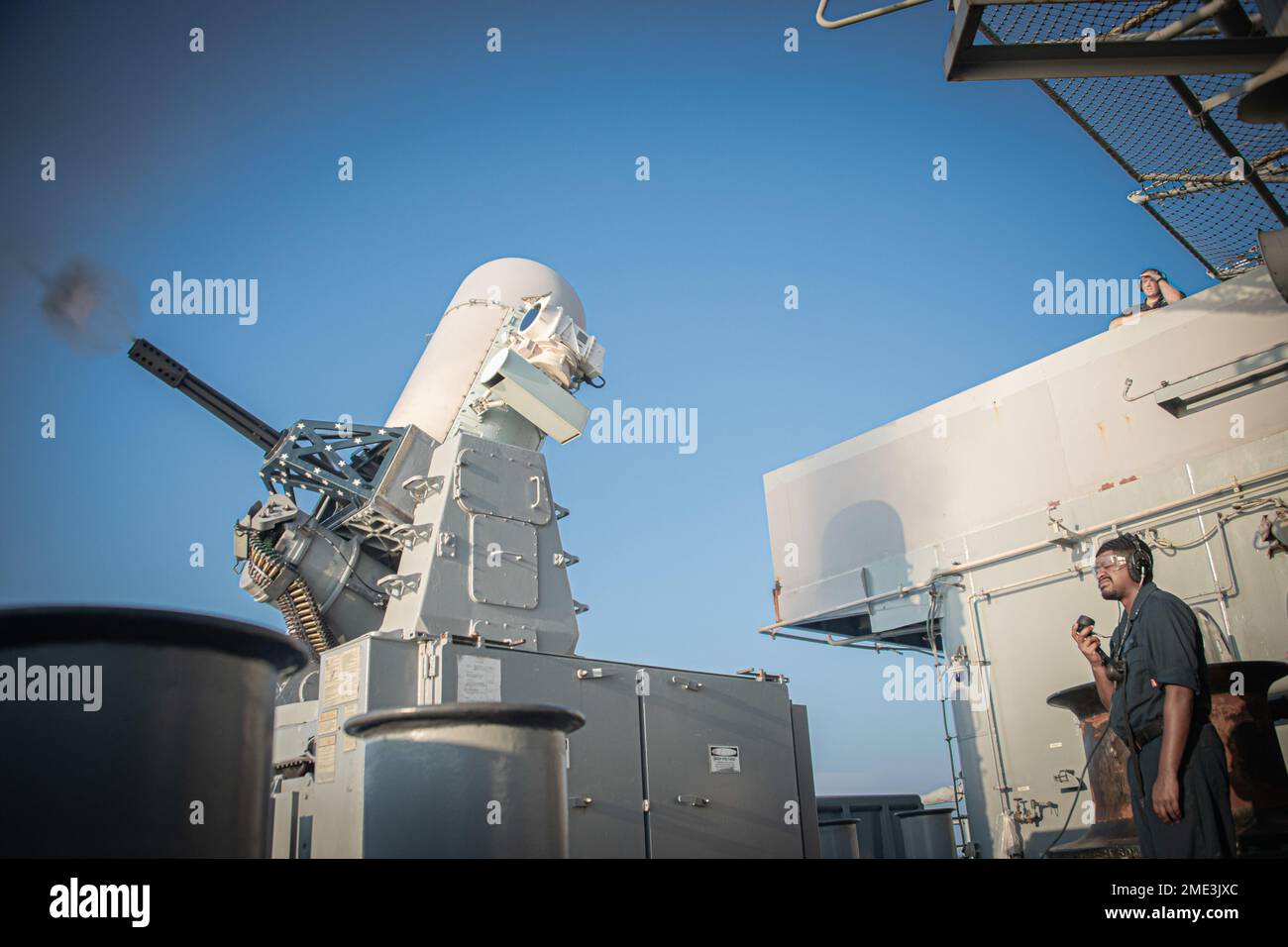 AT SEA (July 27, 2022) Fire Controlman 2nd Class Ellison Arnold, right ...