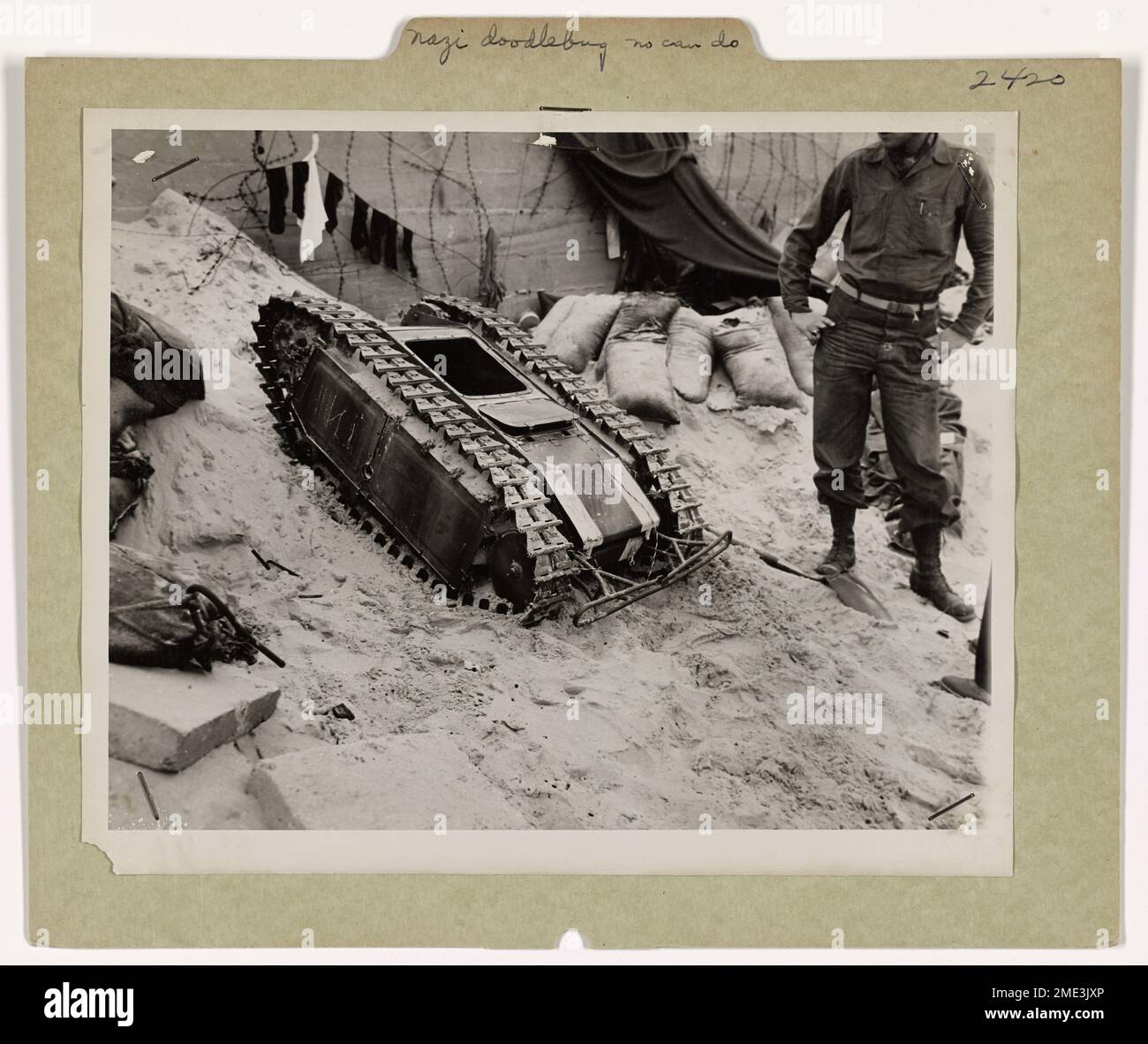 This image shows a captured Nazi 'Doodlebug' tank, a pilotless remote ...