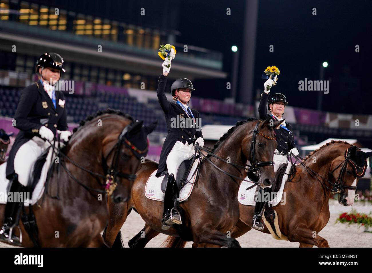 Germany's Dorothee Schneider, from left, Jessica von Bredow-Werndl and ...