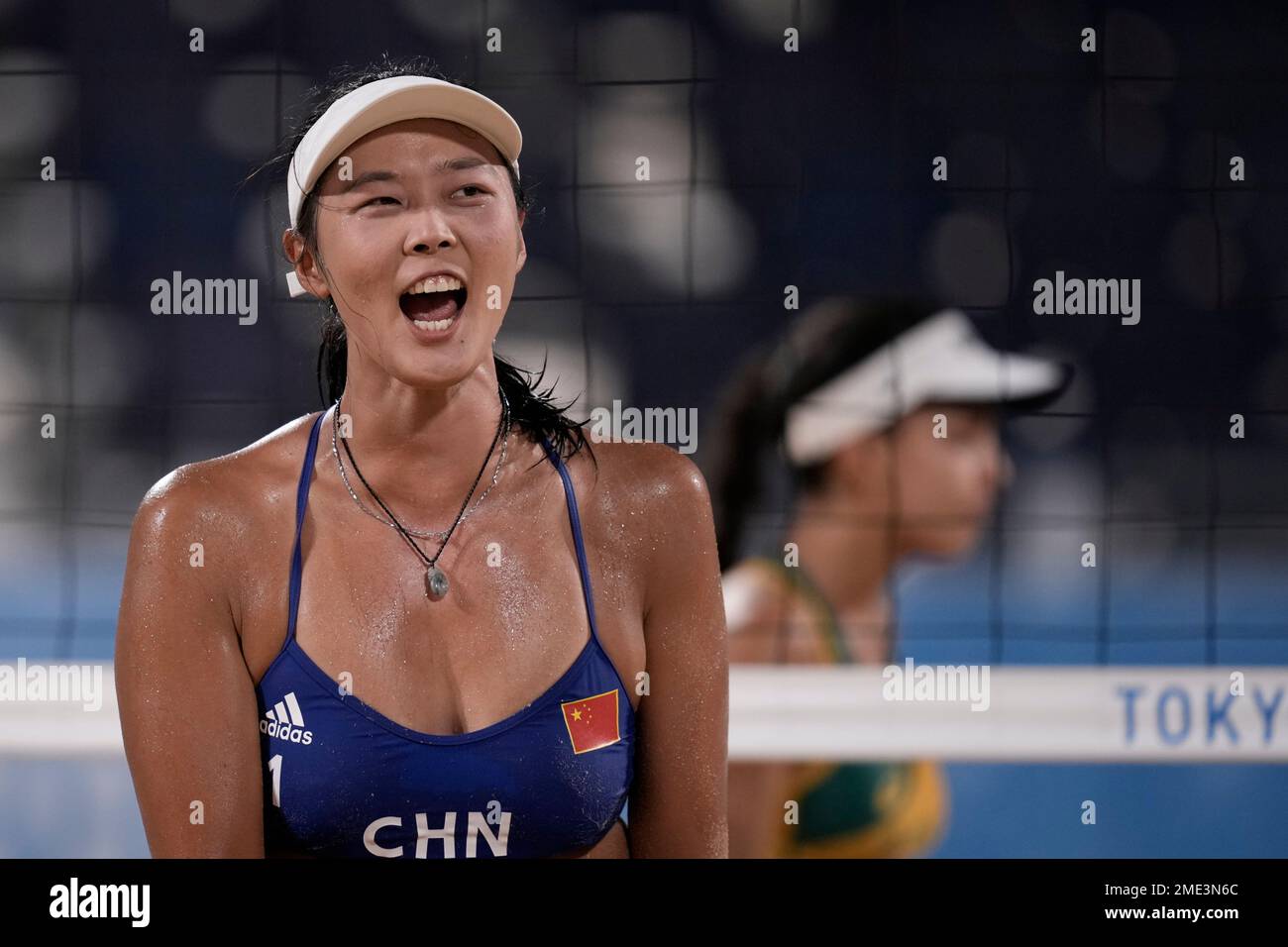 Wang Fan, of China, celebrates a point during a women's beach ...