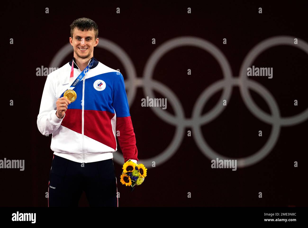 Gold medalist Vladislav Larin of the Russian Olympic Committee stands ...