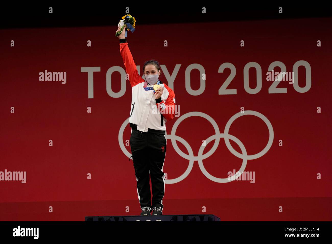 Maude G. Charron of Canada celebrates her gold medal on the podium of ...