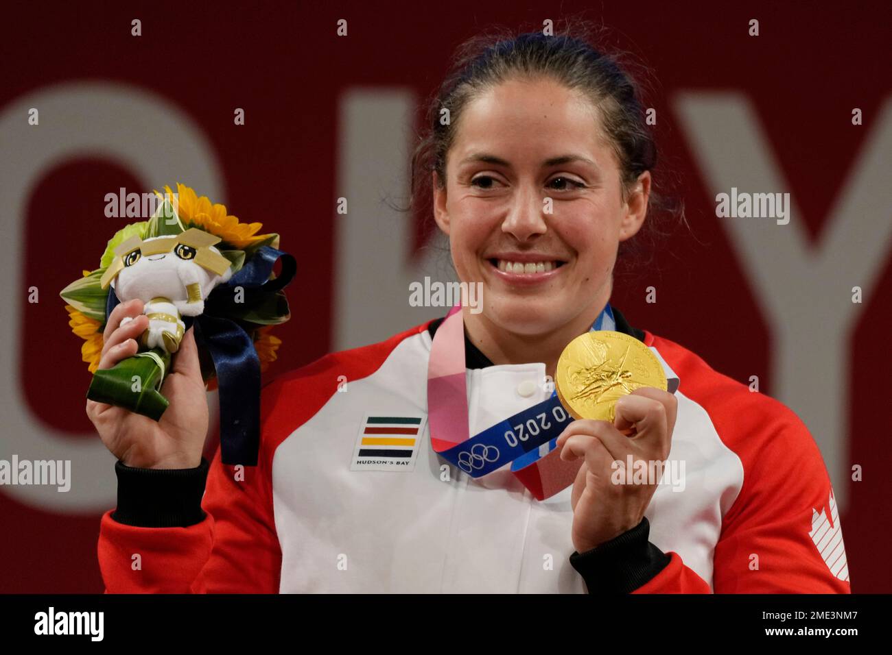 Maude G. Charron of Canada celebrates her gold medal on the podium of ...
