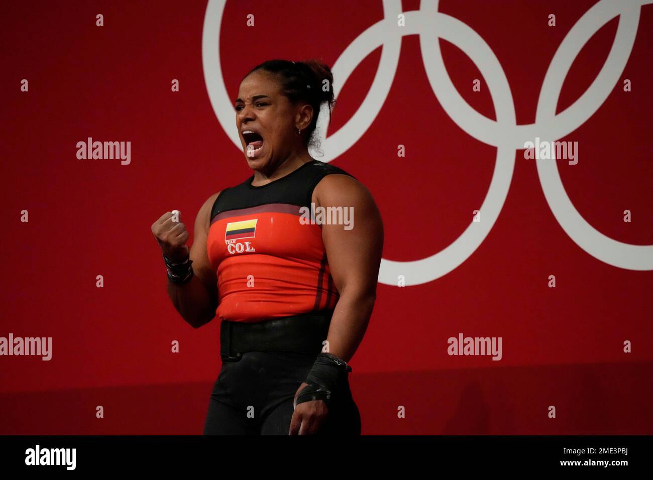 Mercedes Isabel Mercedes Perez Tigrero of Colombia prepares for a lift ...