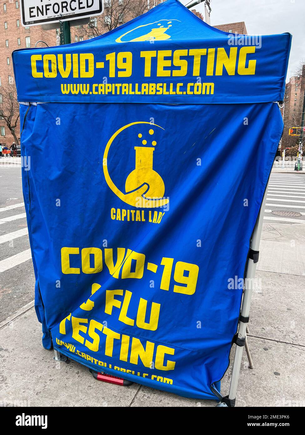 A portable testing booth for COVID-19 and influenza is set up at the ...