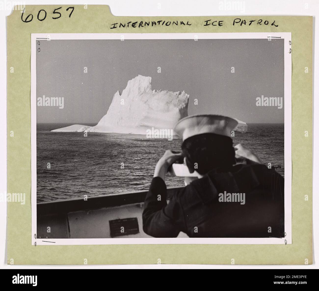 A Coast Guard crew member aboard the U.S. Coast Guard Cutter Evergreen ...
