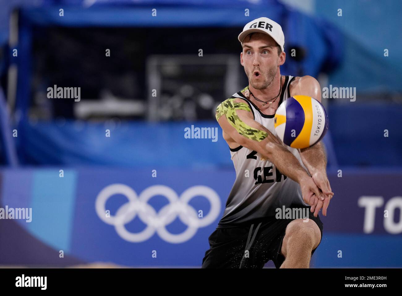 Clemens Wickler, of Germany, returns a shot during a men's beach ...