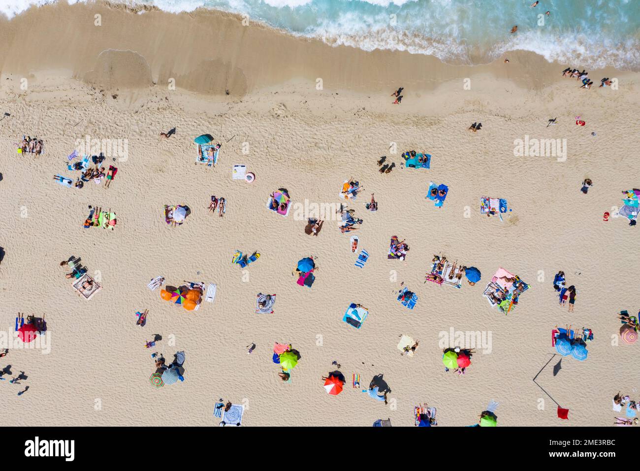 Spain, Majorca, Aerial view of people relaxing on Cala Agulla beach ...