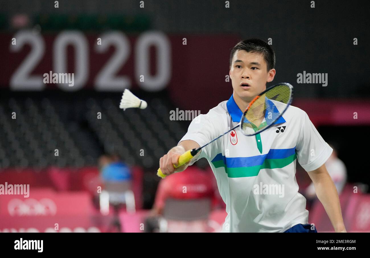 Brian Yang of Canada competes against Sweden's Felix Burestedt during ...
