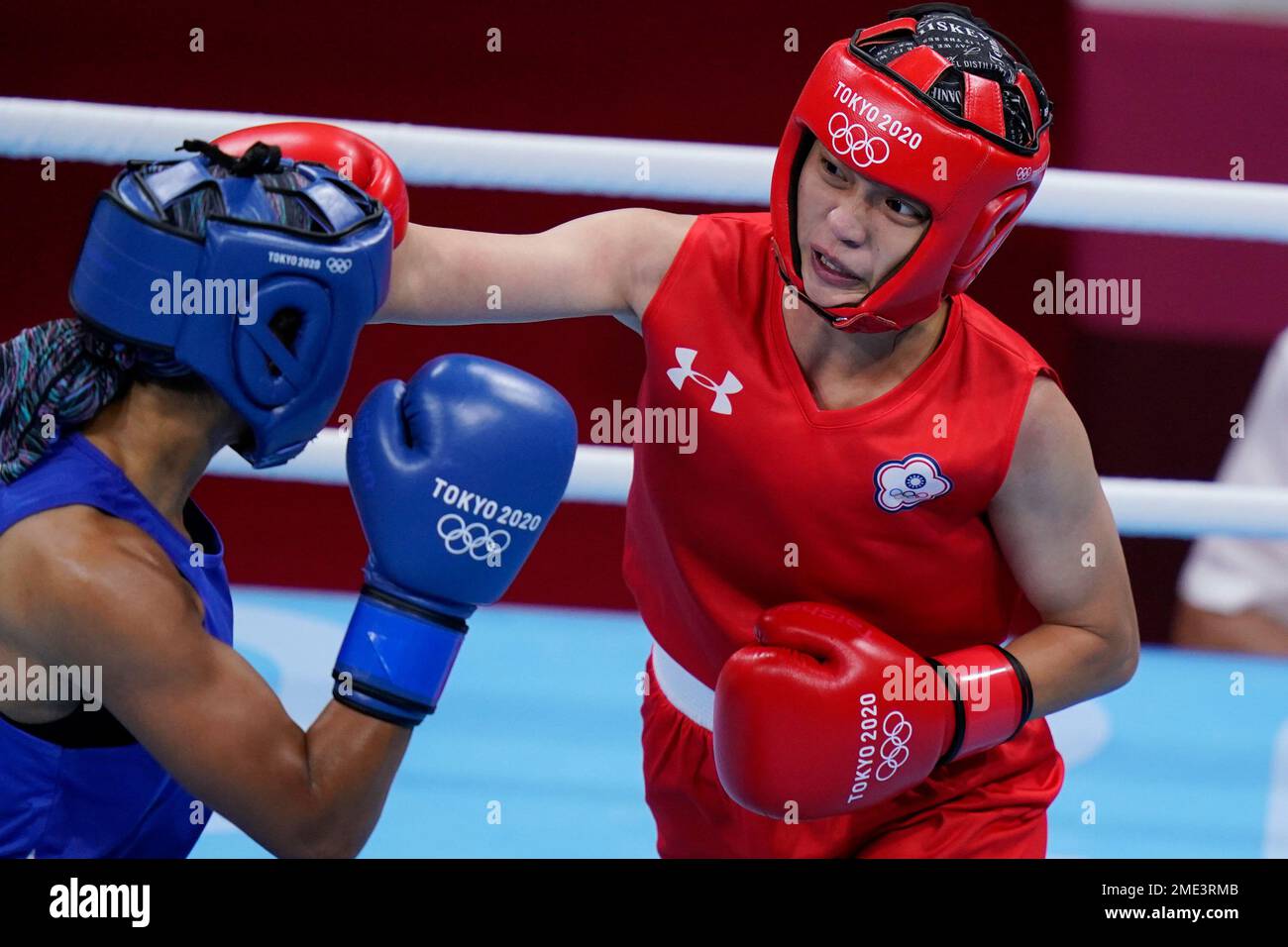 Taiwan's Wu Shih-Yi, right, exchanges punches with Sweden's Agnes ...