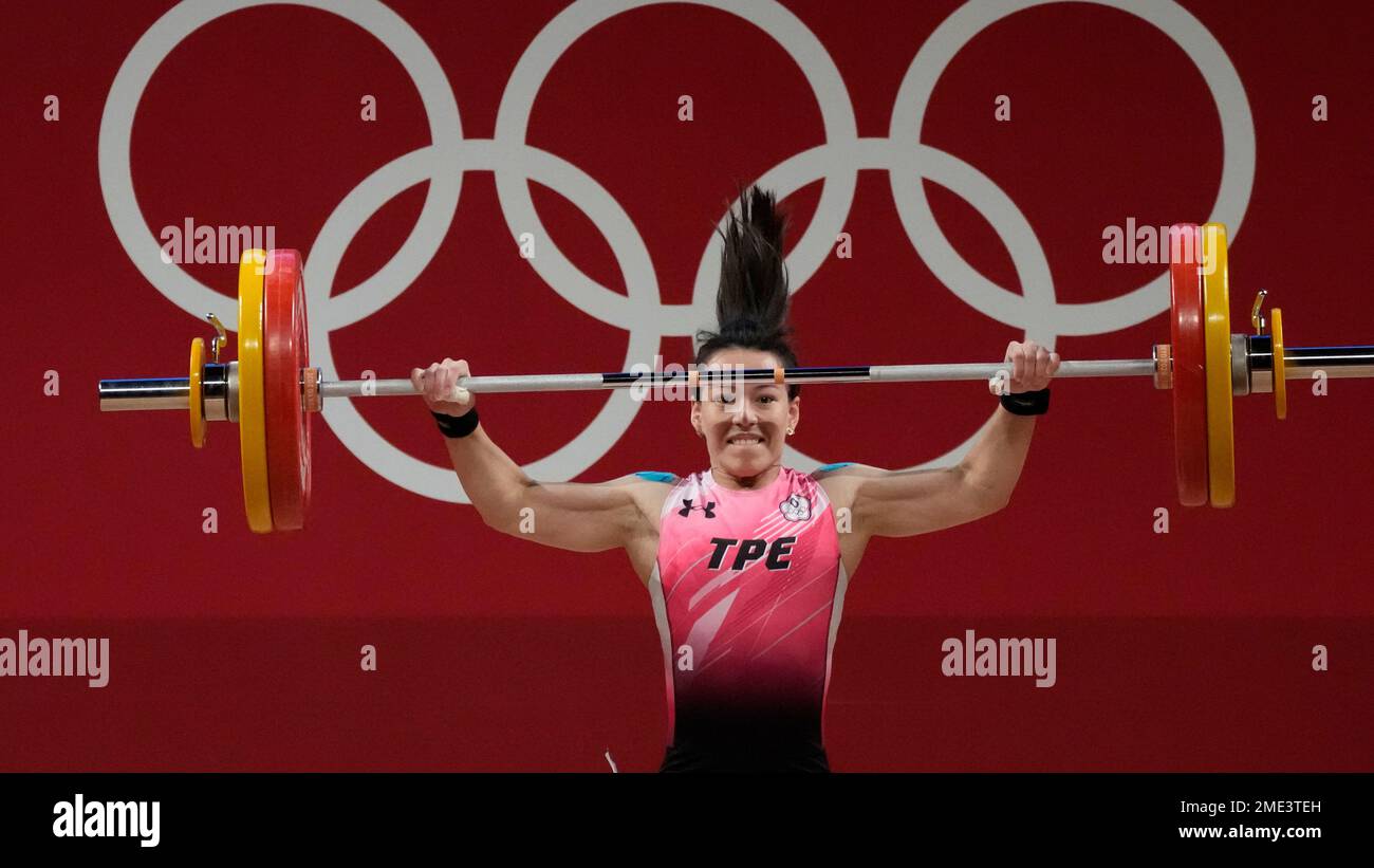 Kuo Hsing-Chun of Taiwan competes in the women's 59kg weightlifting ...