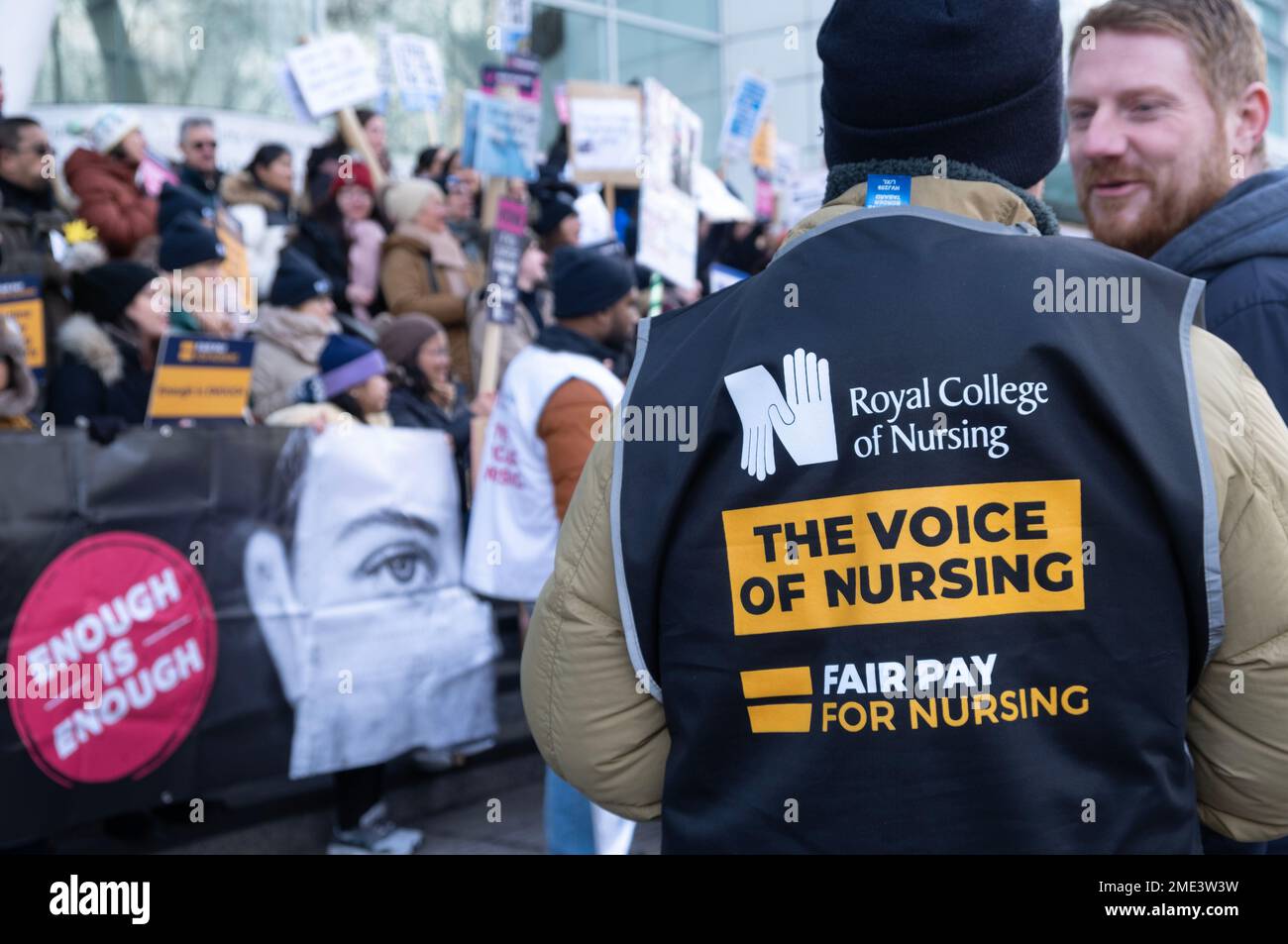 Striking nurses with placards, demonstrating outside University College ...