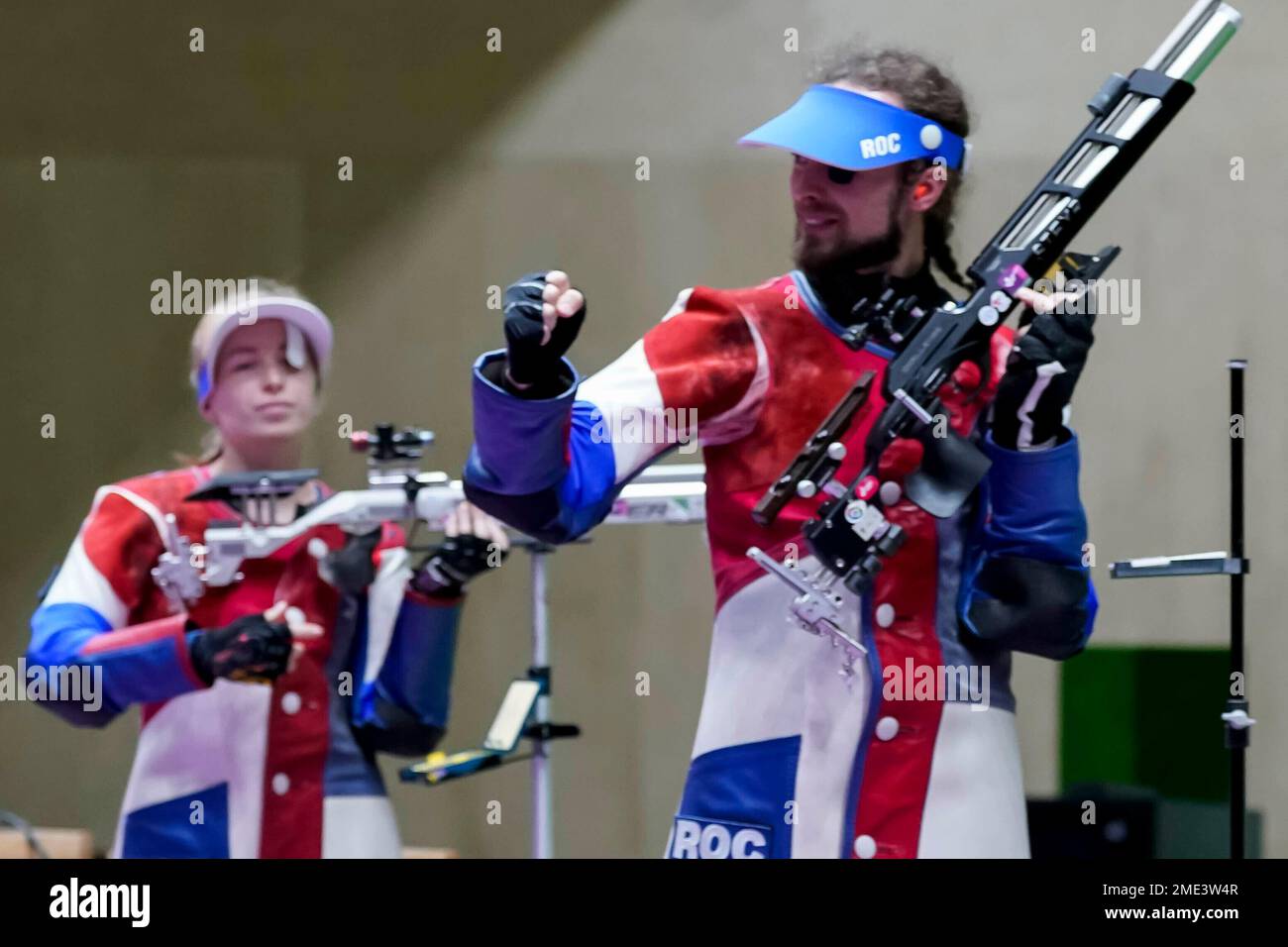 Yulia Karimova, left, and Sergey Kamenskiy, of the Russian Olympic Committee, celebrate after ...