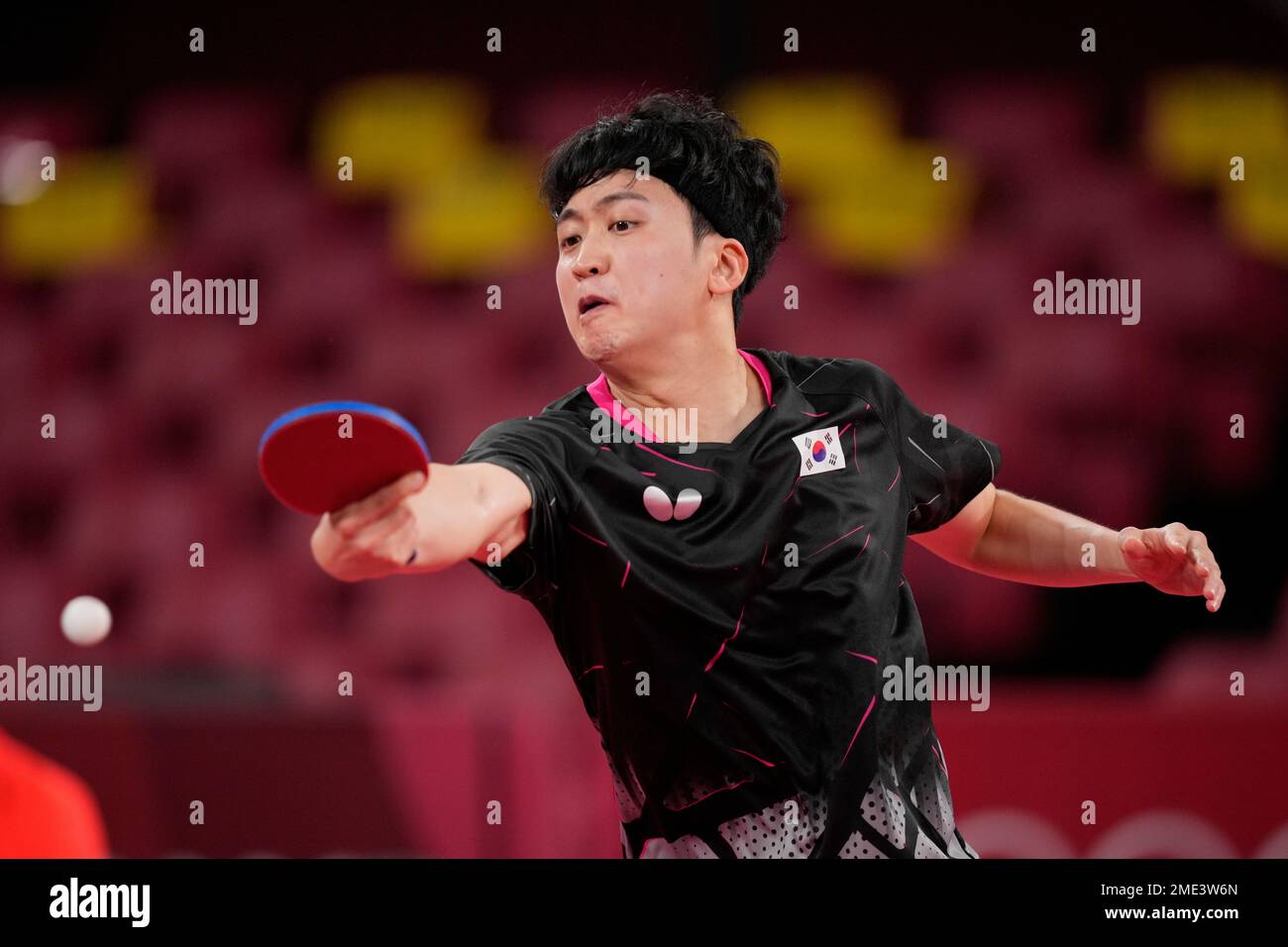 South Korea's Jeoung Young-sik competes during the table tennis men's ...