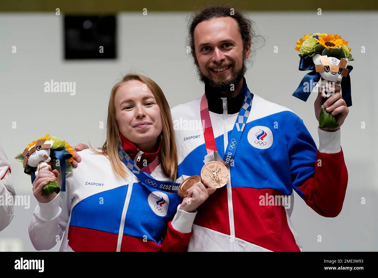 CORRECTS TO BRONZE MEDAL NOT SILVER - Bronze medalists Yulia Karimova, left, and Sergey ...
