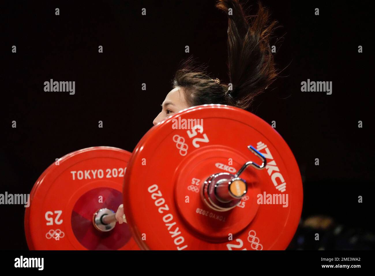 Kuo Hsing-Chun of Taiwan competes in the women's 59kg weightlifting ...