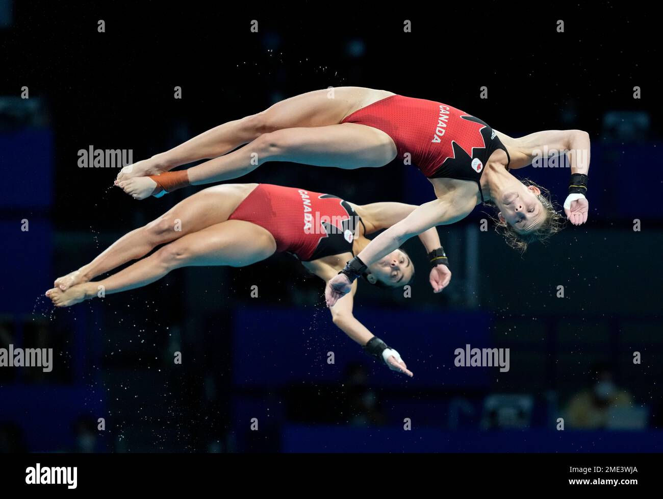 Meaghan Benfeito and Caeli Mckay of Canada compete during the women's ...